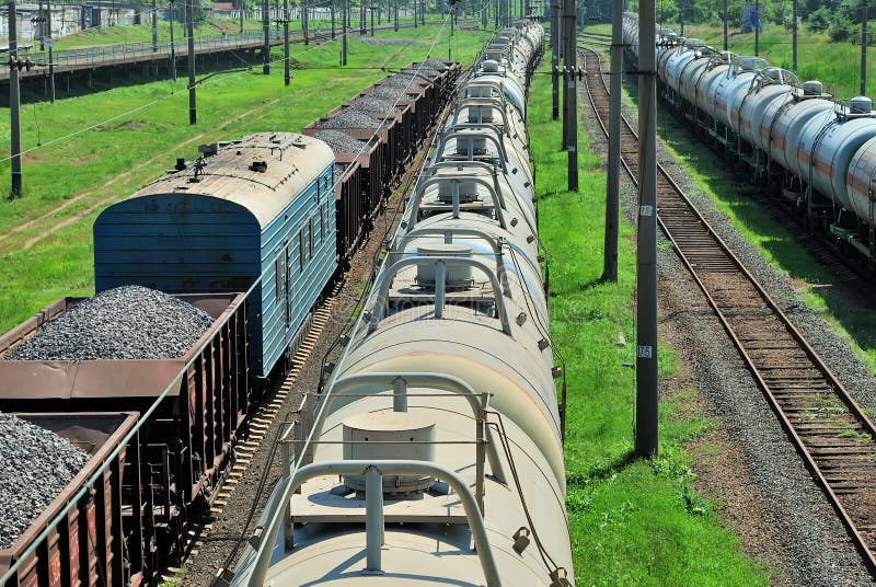 A Lot of Vans Carrying Oil and Coal Stock Photo - Image of railway ...
