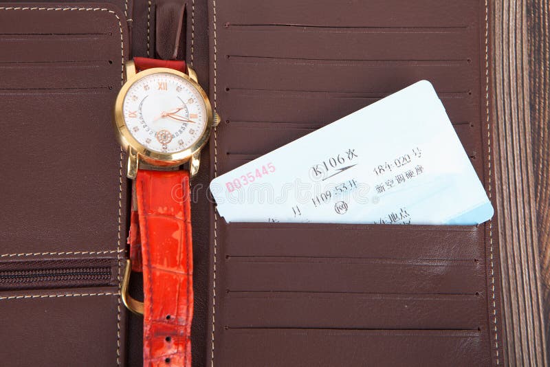 The Train Ticket in the Wallet and a Watch Stock Photo - Image of watch ...