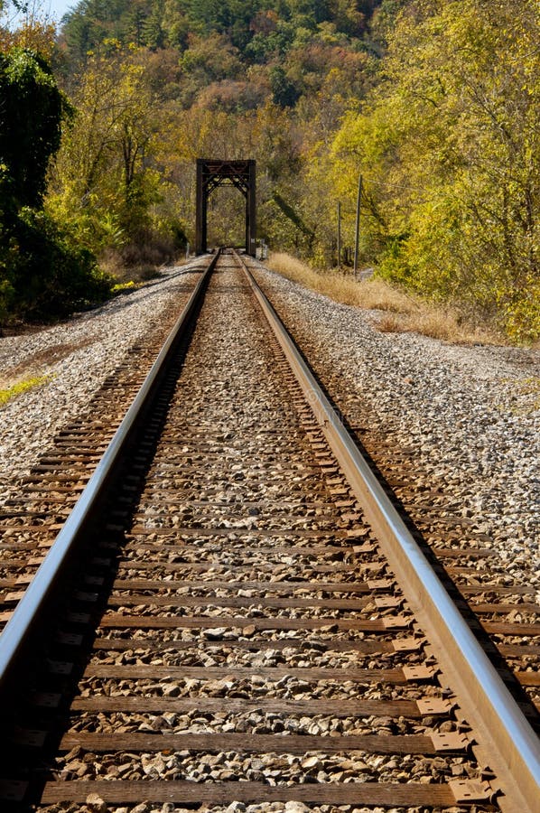 Train track with bridge stock image. Image of leaves - 23036333