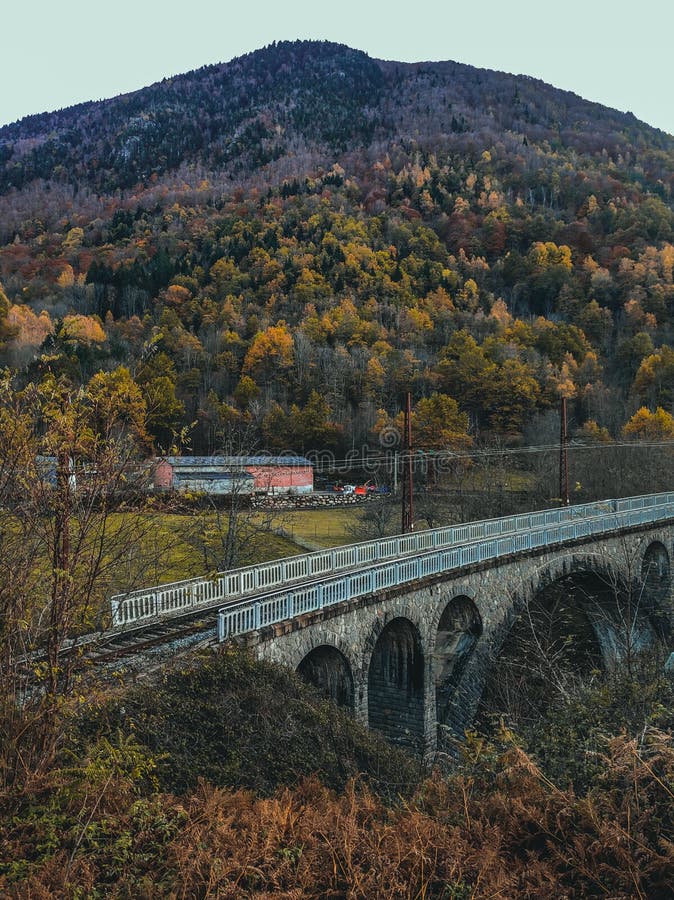 Train Track Bridge Near a Mountain Range of Pyrenees Stock Image ...