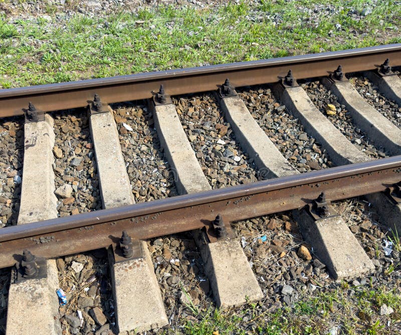 A Train Track with a Lot of Rocks and Debris on it Stock Photo - Image ...