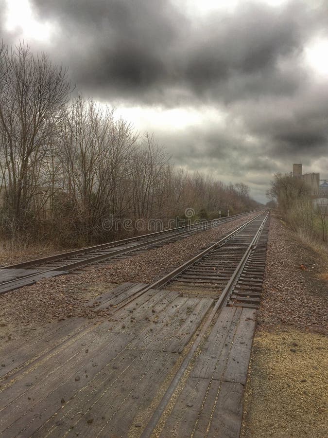 Train Track Under Storm Clouds Stock Image - Image of road, train: 68809987