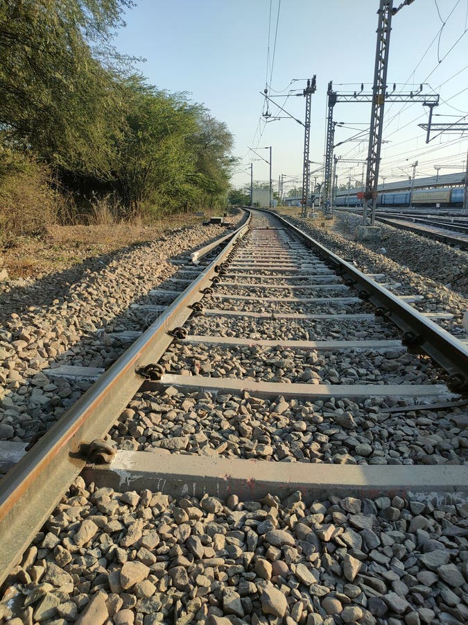 Train Tracks Beautiful Sunset Reflection on Train Tracks Stock Image ...