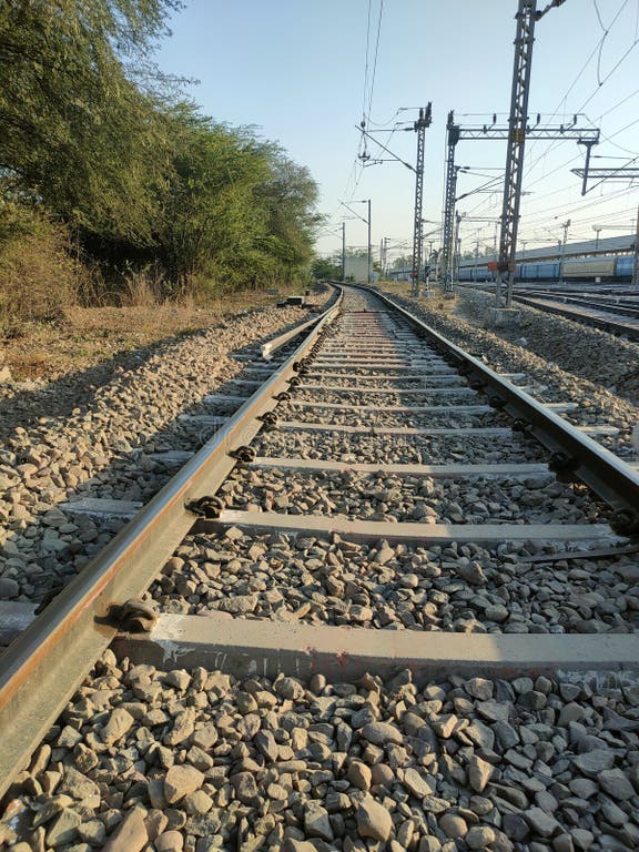 Train Tracks Beautiful Sunset Reflection on Train Tracks Stock Image ...