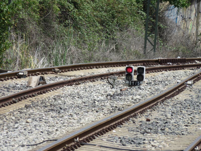 Train Tracks with Colored Traffic Lights. Stock Image - Image of ...