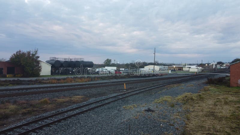 Train Tracks Cutting through Industrial Area Stock Photo - Image of ...