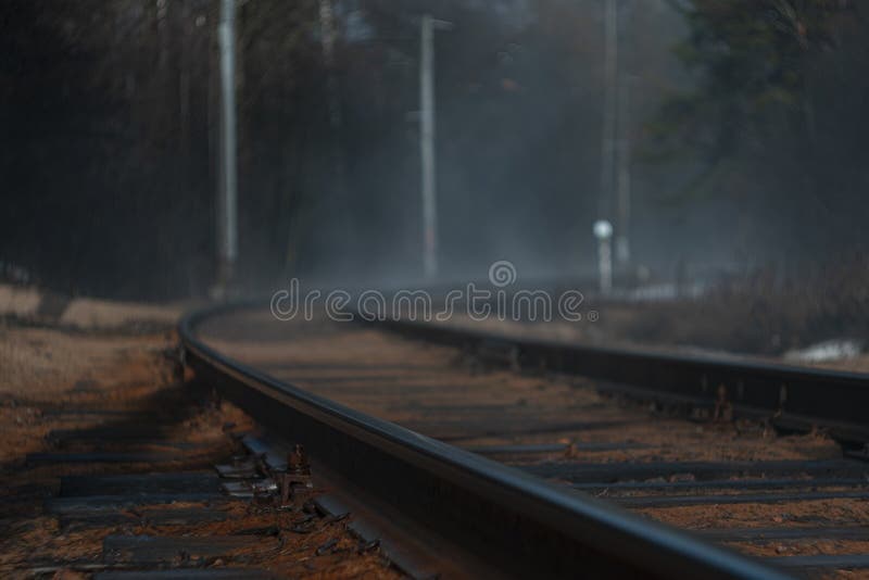 Train tracks in the fog stock photo. Image of tracks - 214938824