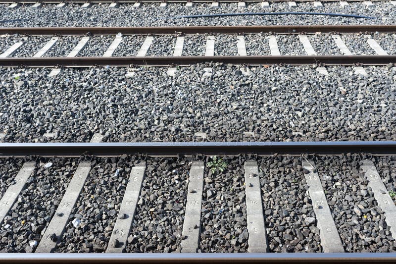 Train tracks on pebbles stock image. Image of wood, symbol - 231160645