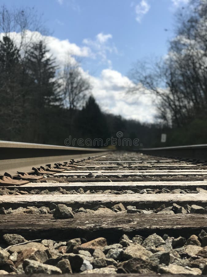 Train tracks stock image. Image of rocks, outside, woods - 190892763