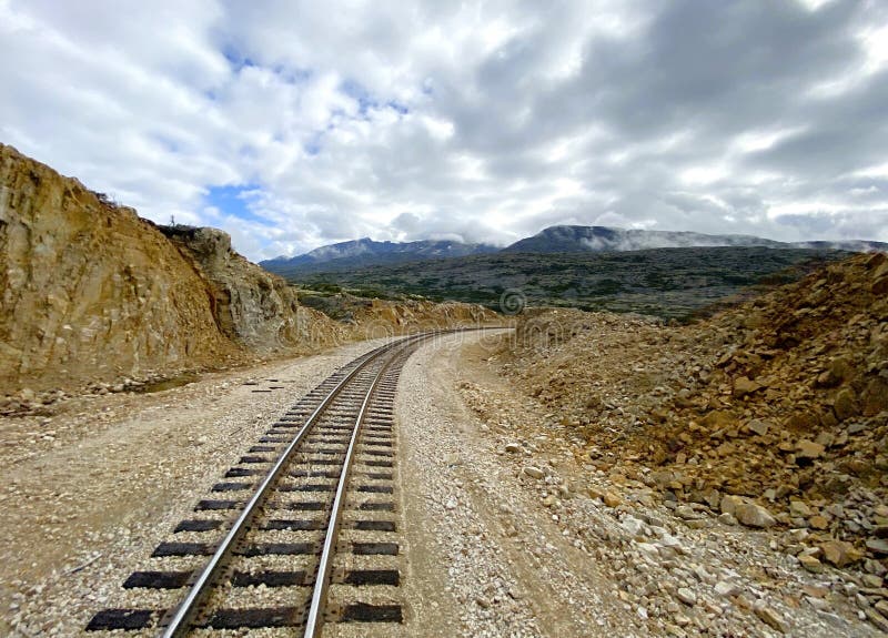 Train Tracks Running through a Mountain Range Stock Photo - Image of ...