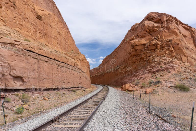 Train Tracks Surrounded by Rock Walls in Utah Stock Image - Image of ...