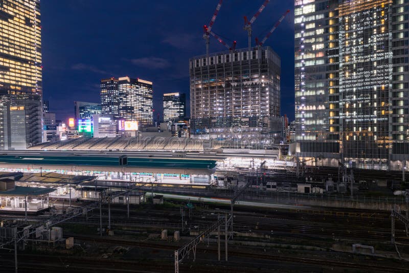 Train Tracks in Tokyo Station after Sunset Editorial Photo - Image of ...
