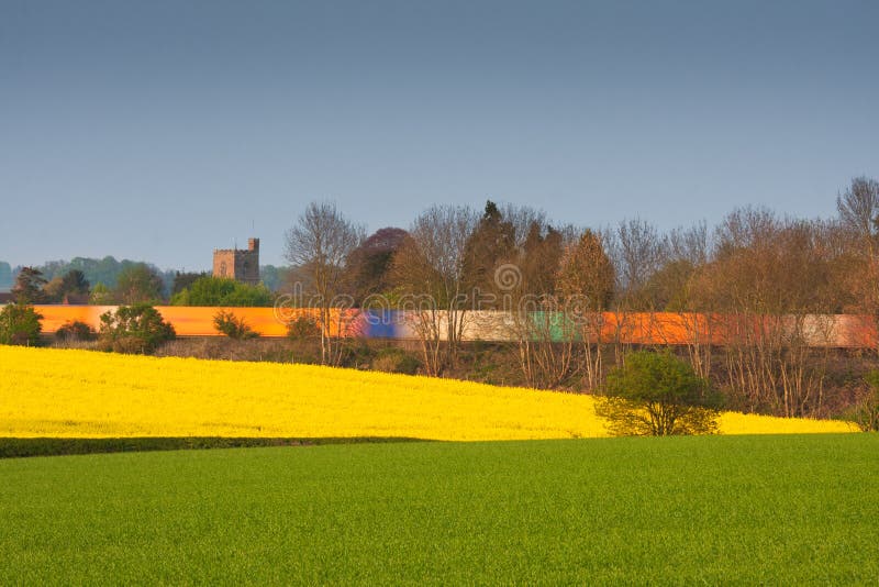 Train Travelling through a Landscape in Spring Stock Image - Image of ...
