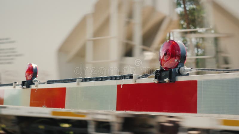 The Train Travels Behind the Railway Barrier Stock Video - Video of ...