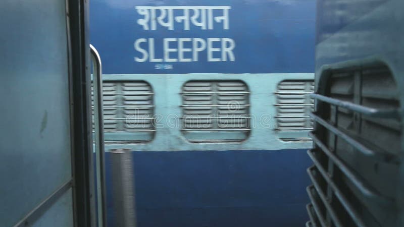 View of Moving and Stationary Trains on Railway Tracks at a Station in ...