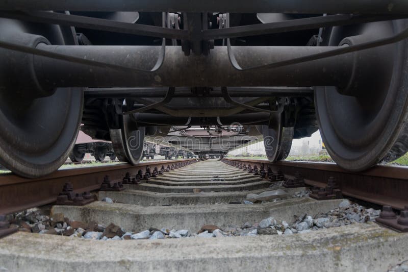 Train Wheels from Below from the Tracks Stock Image - Image of railroad ...