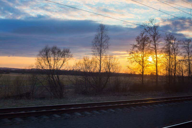 Train Window View with Dramatic Sunset Light Stock Photo - Image of ... Train Window View with Dramatic Sunset Light Stock Photo - Image of ...