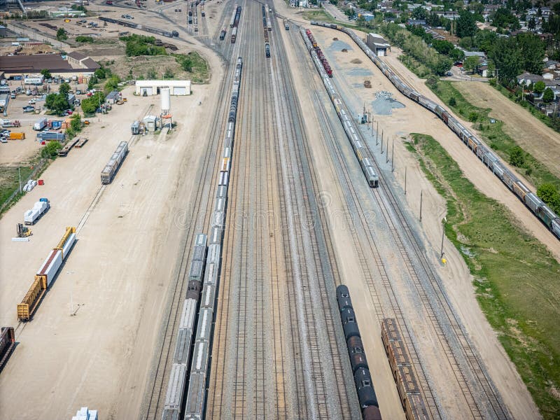 Train Yard with Many Trains on the Tracks Stock Image - Image of ...