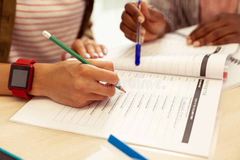 Two Students Completing Task in Their Copybook Stock Image - Image of ...