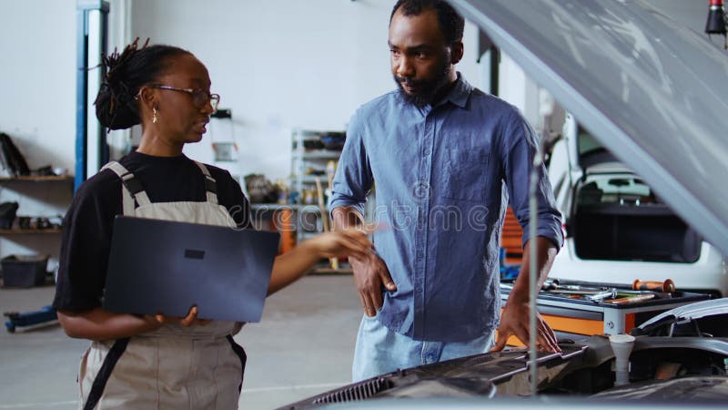 Engineer Does Checkup on Client Car Stock Footage - Video of worker ...