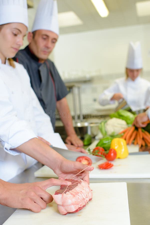 Trainee Chef Learning To Tie Joint Meat Stock Photo - Image of meal ...