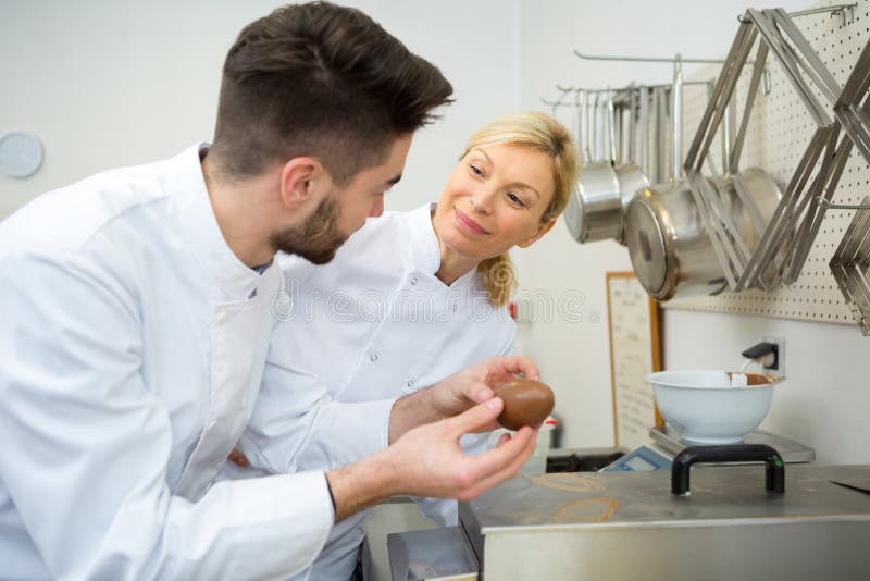 Trainee Chef Making Chocolate Egg Stock Photo - Image of color ...