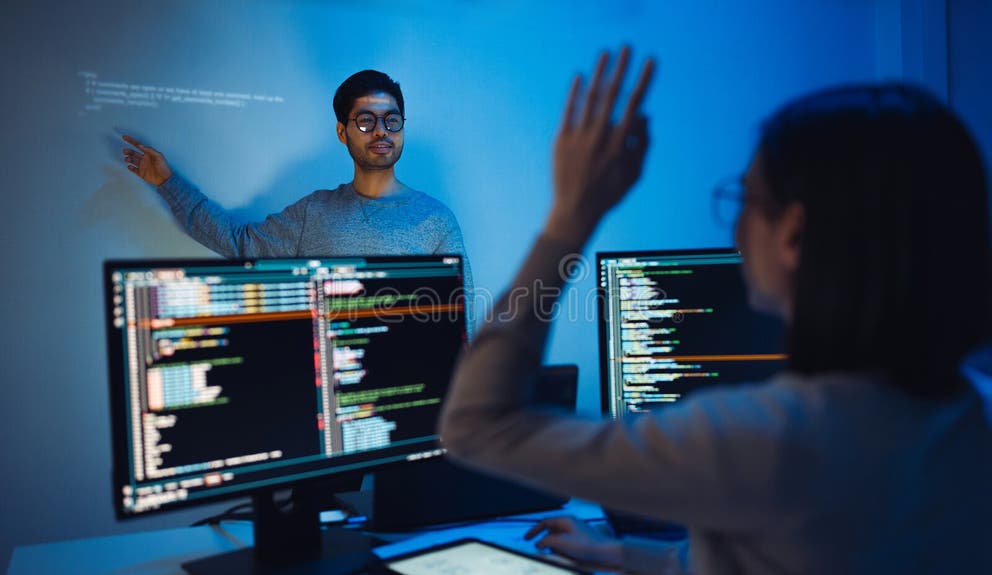 Trainee Developer Hand Up To Ask Speaker about Software Coding Project Presentation at Night in ...