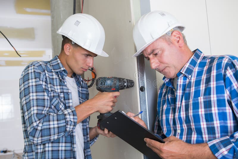Trainee Electrician Learning Trade Stock Photo - Image of handyman ...