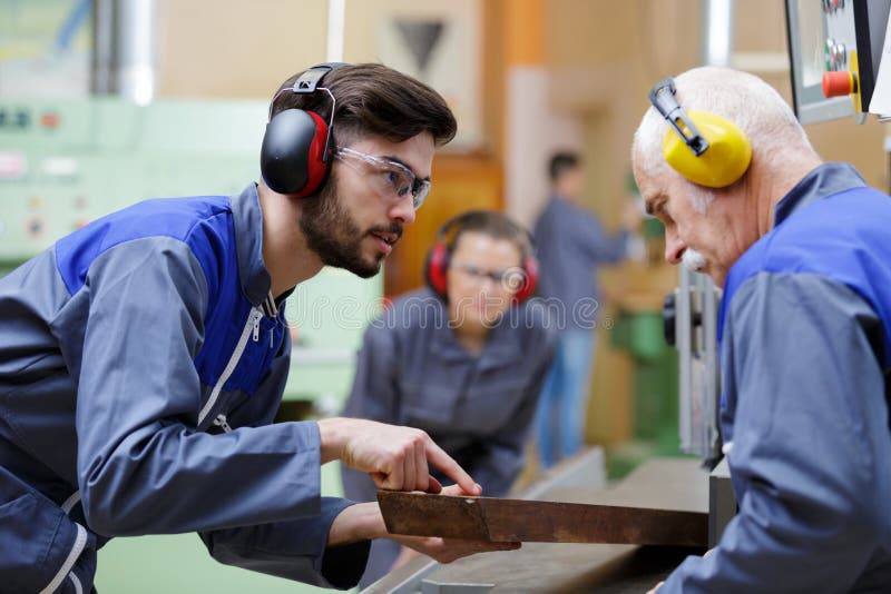 Trainee Manual Worker Asking Senior Supervisor Question Stock Image ...
