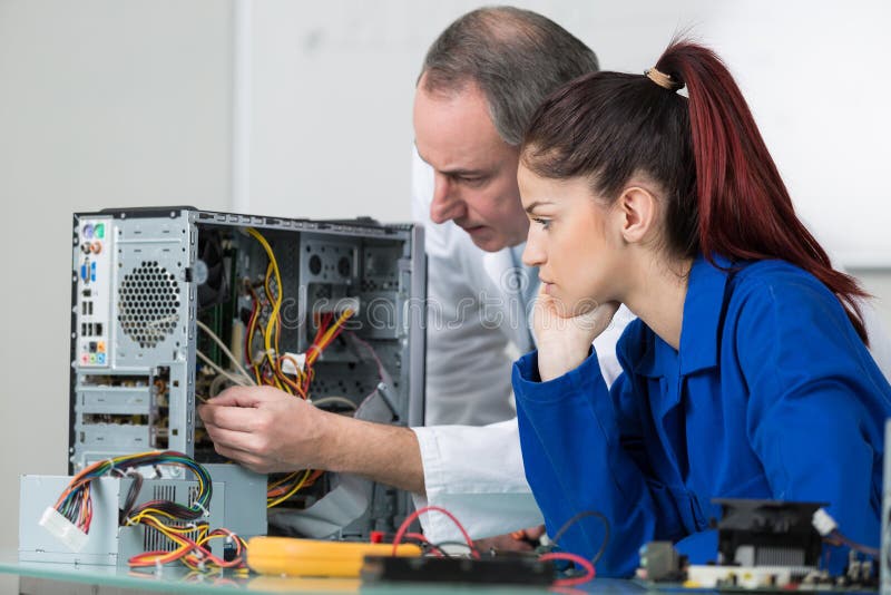 Trainee Technician Learning To Repair Computer Stock Photo - Image of ...
