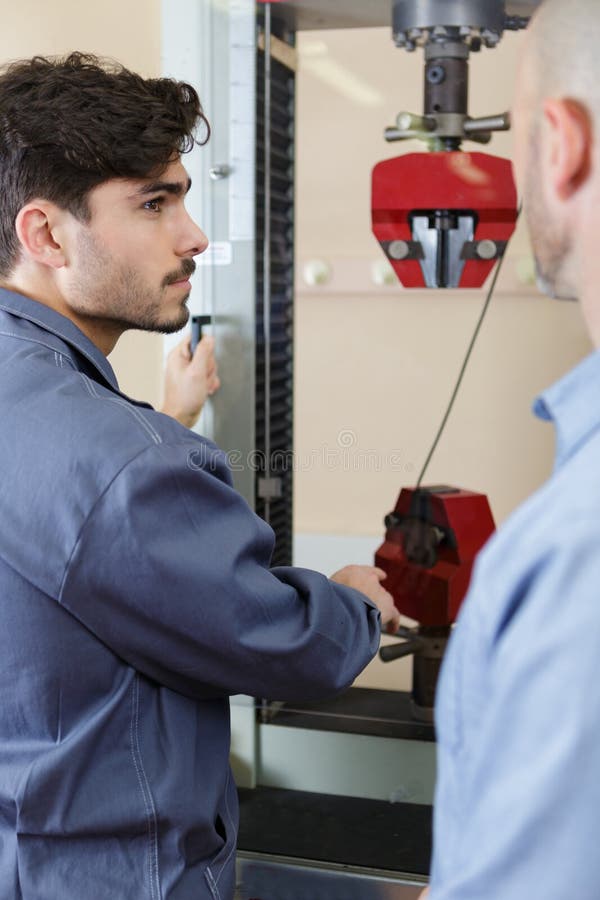 Trainer and Apprentice in Technical Training Stock Photo - Image of ...