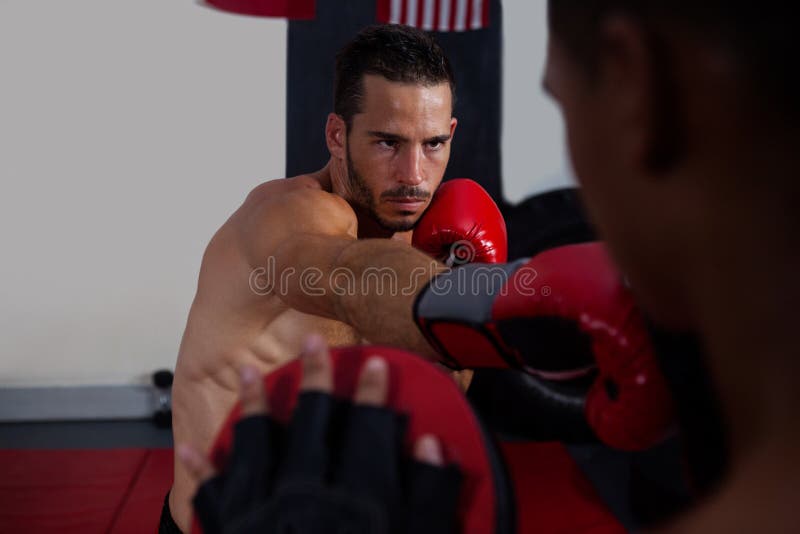 Trainer Assisting Man in Boxing Stock Photo - Image of fight, adult ...