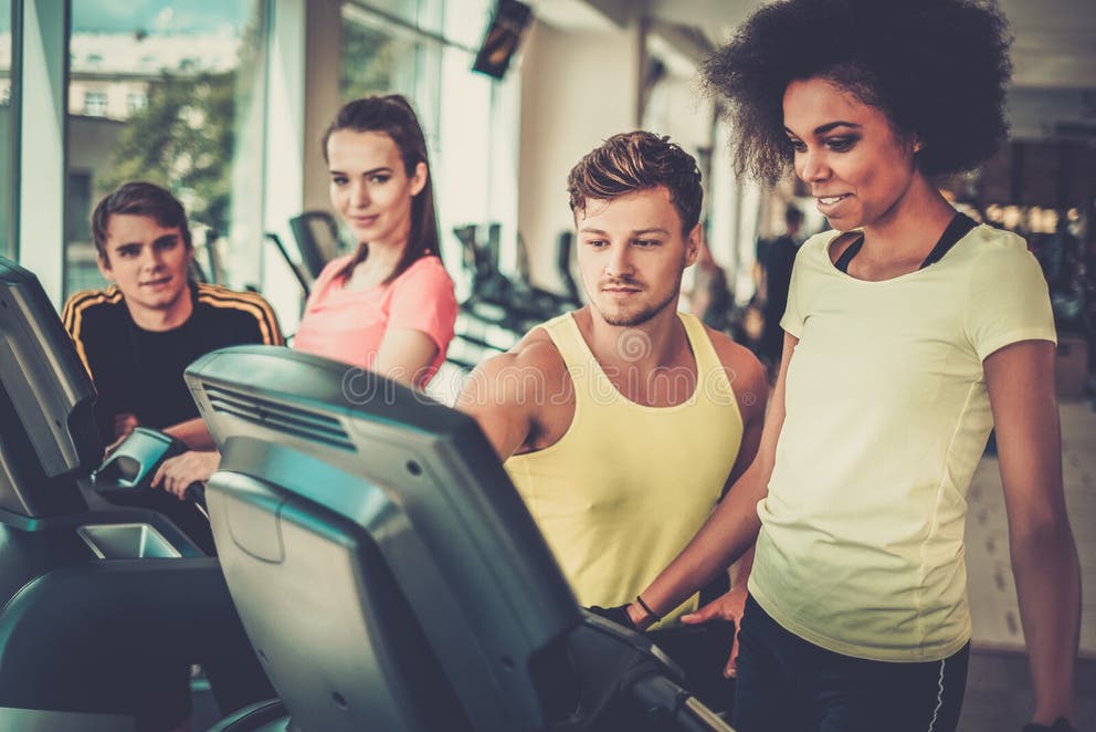 Trainer Explaining How To Use Treadmill Stock Image - Image of machine ...