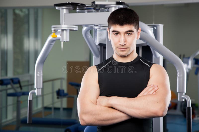 Trainer in a Fitness Center Stock Image - Image of back, attractive ...