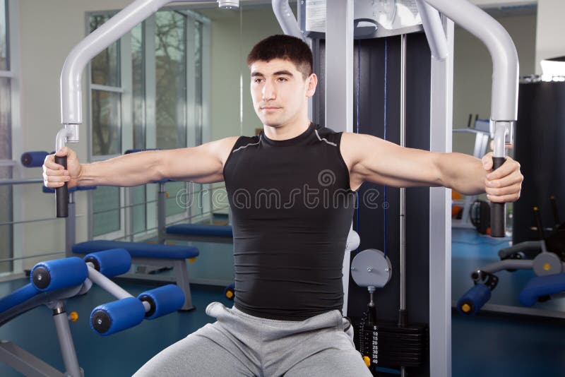Trainer in a Fitness Center Stock Photo - Image of athlete, chest: 28618168