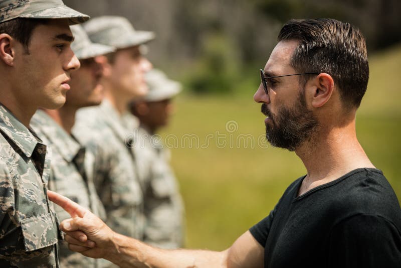 Military Trainer Giving Training To Military Soldier Stock Image ...