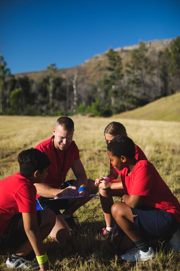 Trainer Instructing Kids in the Boot Camp Stock Image - Image of ...