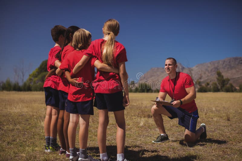 Trainer Instructing Kids in the Boot Camp Stock Photo - Image of ...