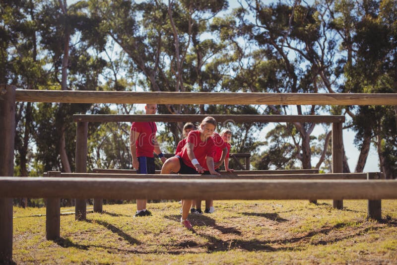 Trainer Instructing Kids during Obstacle Course Training Stock Image ...