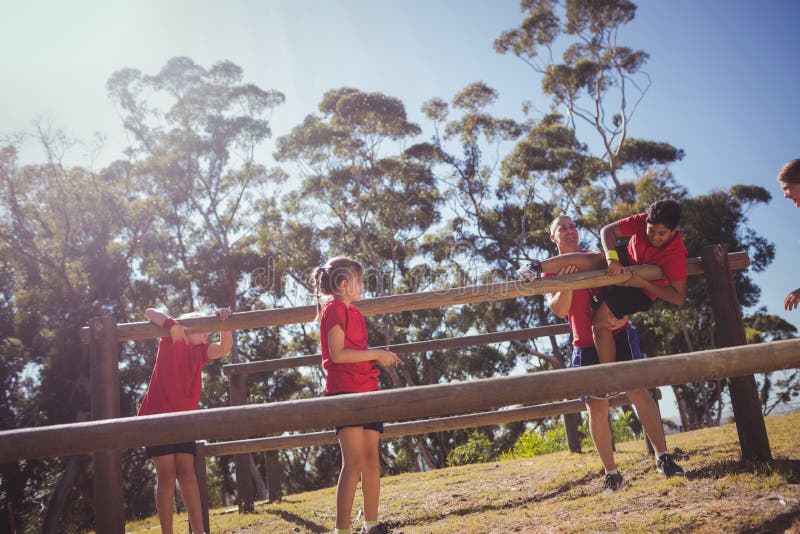 Trainer Instructing Kids during Obstacle Course Training Stock Image ...