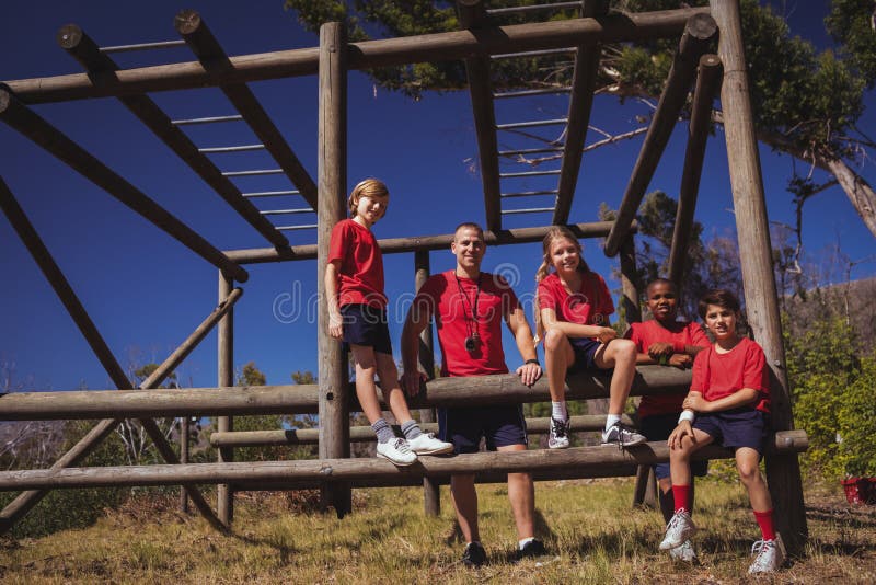 Trainer and Kids Relaxing in the Boot Camp Stock Image - Image of black ...