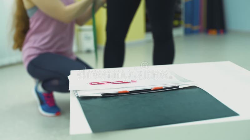 Trainer Measuring Plump Woman and Making Notes Stock Video - Video of ...