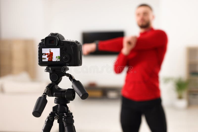 Trainer Recording Workout at Home, Focus on Camera. Space for Text ...