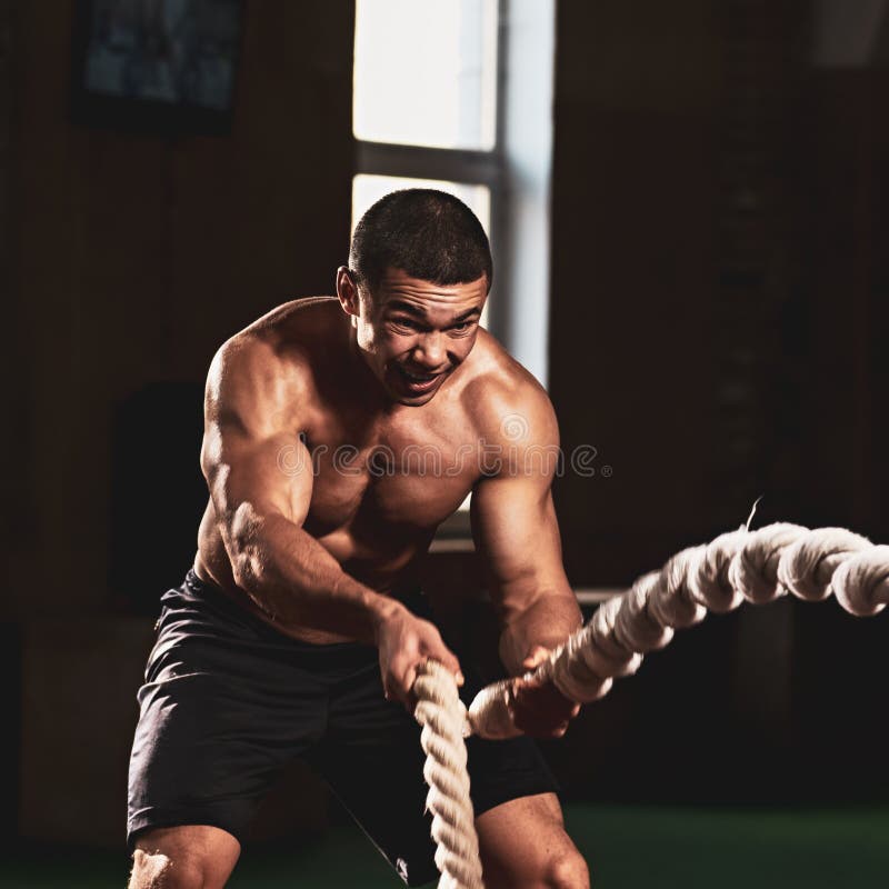 Training with battle rope stock photo. Image of athletic - 152708376
