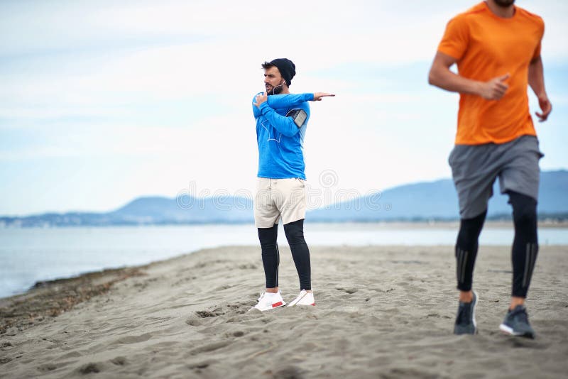 A training on the beach stock photo. Image of active - 196683712