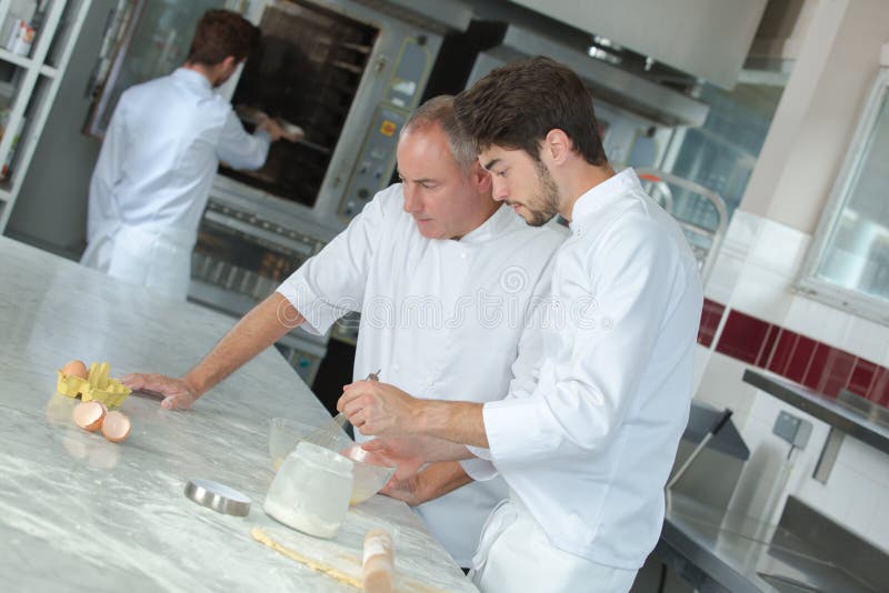 Training Cook Apprentice Trainee Cooking with Chef Stock Image - Image ...
