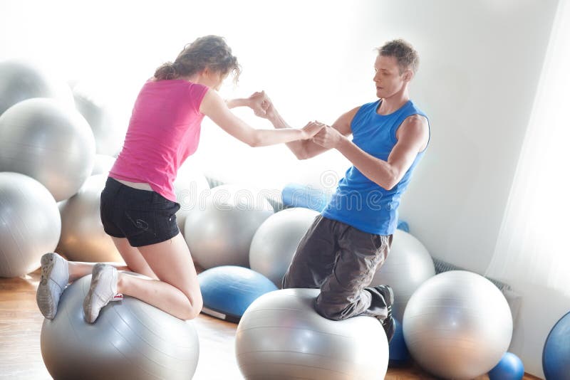 Training - Couple on Stability Balls Stock Photo - Image of caucasian ...