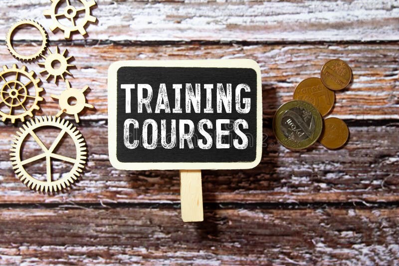 Training Courses, Business Concept. Stack of Books and Pencils on the ...