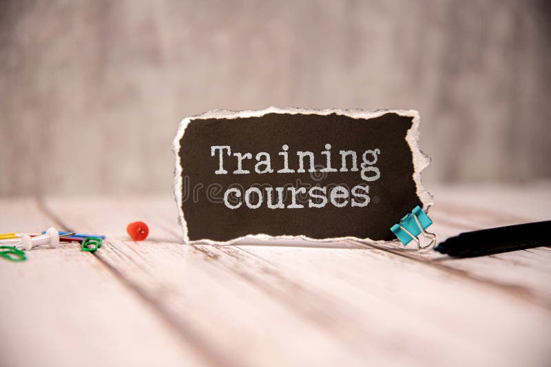 Training Courses Text on Notepad, Concept Background Stock Photo ...