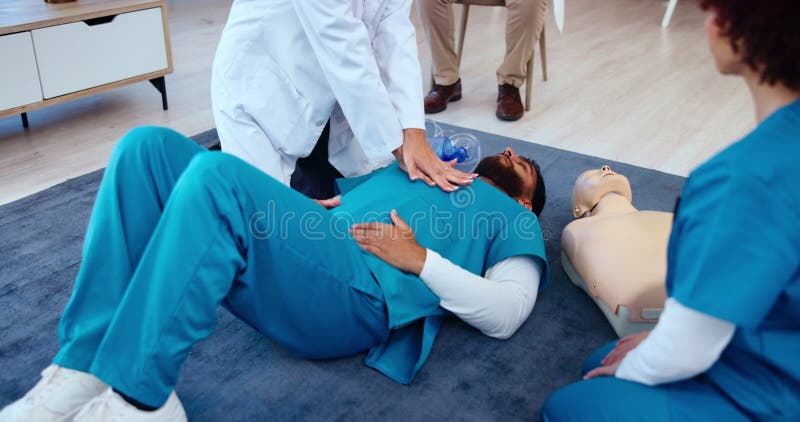 Training, Cpr Workshop and Man for Learning, Doctor or Breathe Check Practical. Paramedic ...